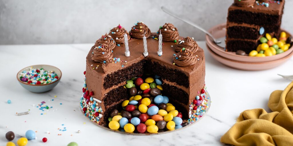 Step-by-step Guide to Make Chocolate Pinata Party Cake - Hogr Blog